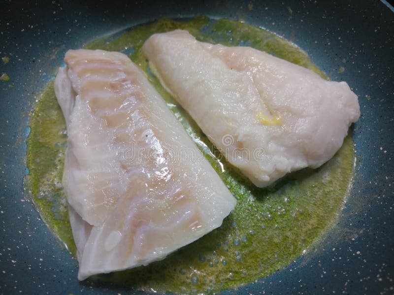 Raw oily cod frying stock image. Image of meal, frying - 107064491