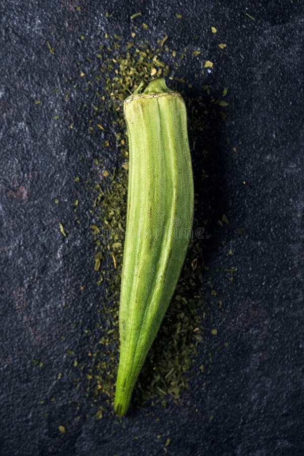 Raw Okra Pod on a Black Stone Surface Stock Photo - Image of healthy ...