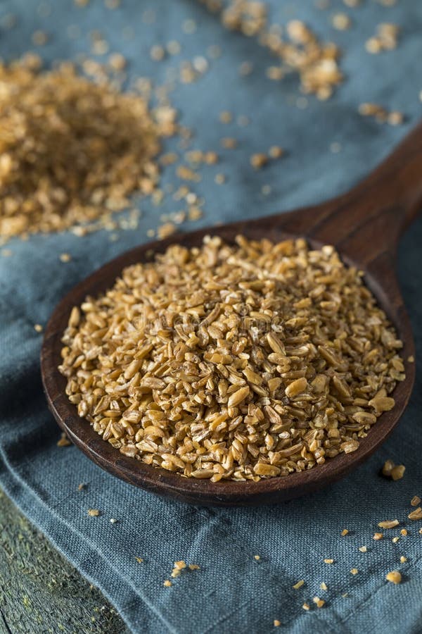 Raw Organic Brown Bulgar Wheat Stock Photo - Image of heap, cereal ...