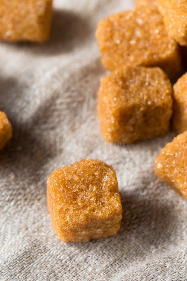 Raw Organic Brown Sugar Cubes Stock Photo - Image of pile, beige: 135800134
