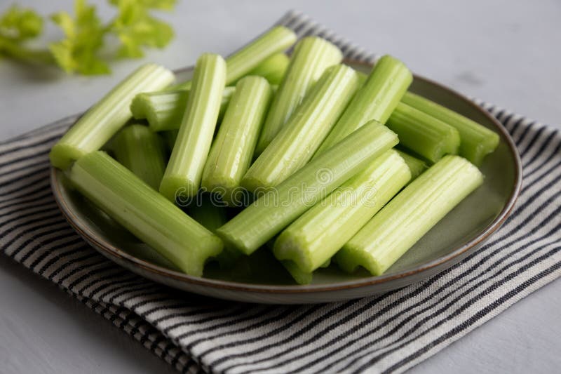 Raw Organic Celery Sticks on a Plate, Side View Stock Image - Image of ...