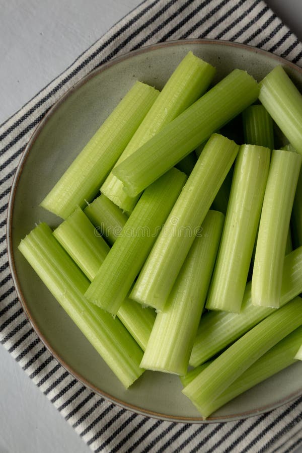 Raw Organic Celery Sticks on a Plate, Top View Stock Photo - Image of ...