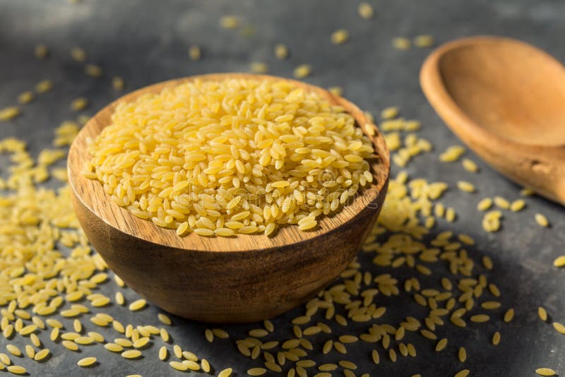 Raw Organic Dry Orzo Pasta stock image. Image of meal - 221410173