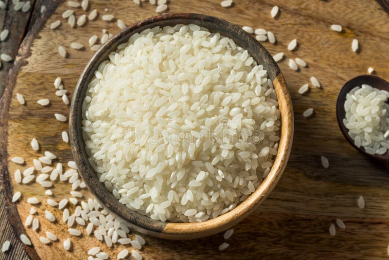 Raw Organic Dry White Rice stock image. Image of lunch - 181669735
