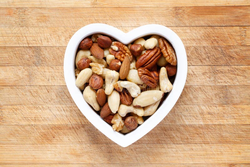 Raw Organic Nuts in Heart Shaped Bowl Stock Image - Image of mixed ...