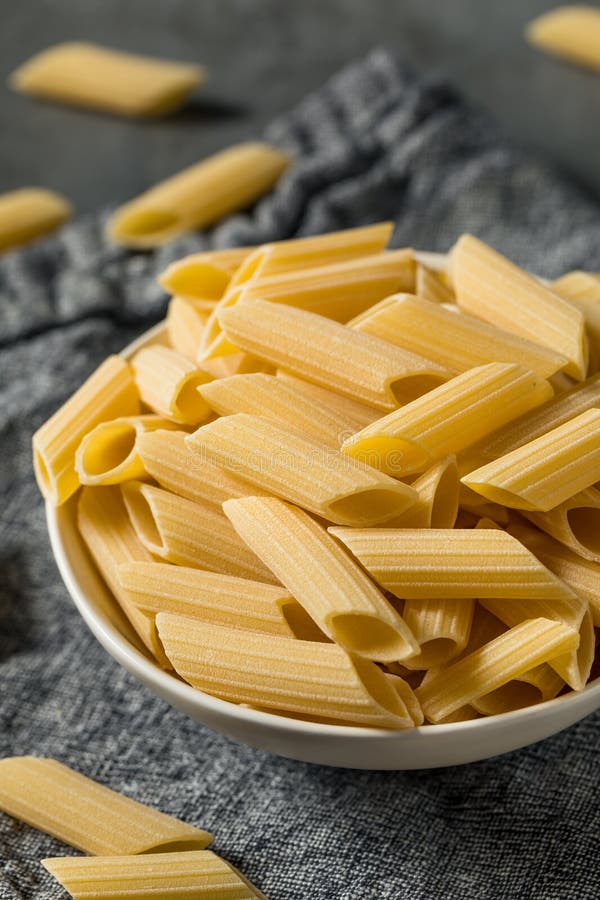 Raw Organic Pennoni Pasta stock photo. Image of pasta - 270289374