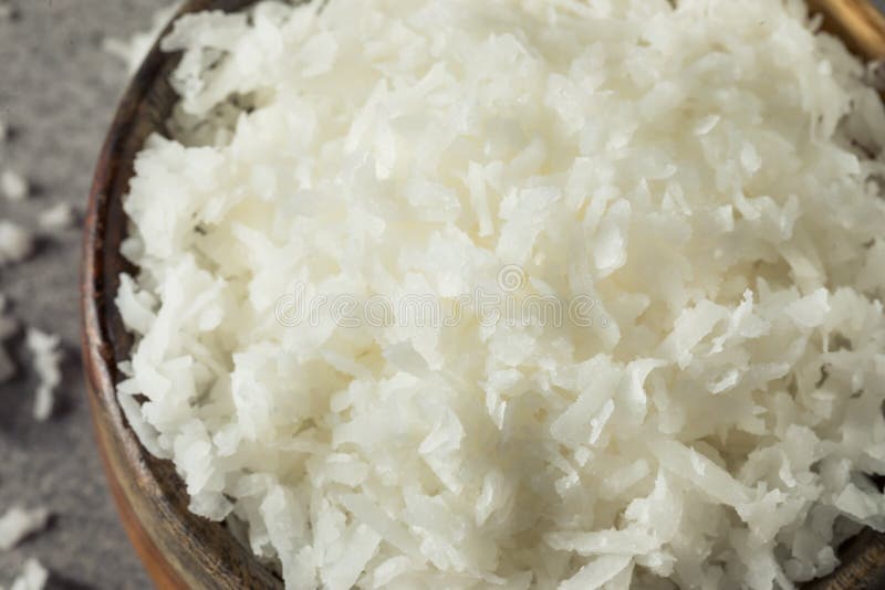 Raw Organic Shredded Coconut Flakes Stock Photo - Image of fruit, snack ...