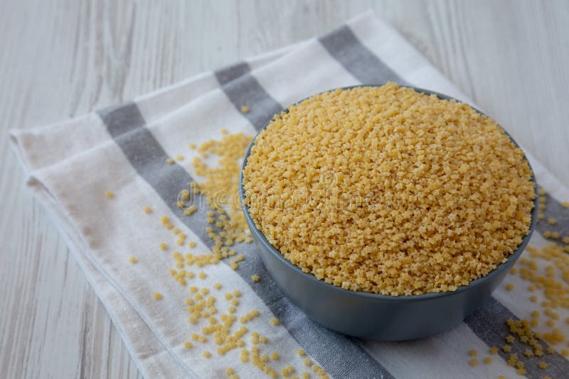 Raw Organic Stelline Pasta in a Bowl, Side View. Space for Text Stock ...