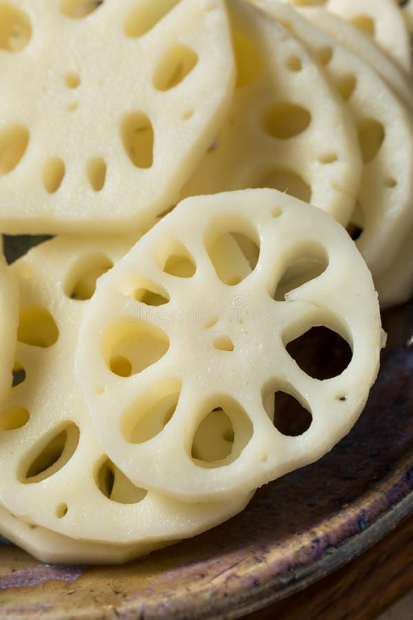 Raw Organic White Lotus Root Stock Photo - Image of oriental, sliced ...