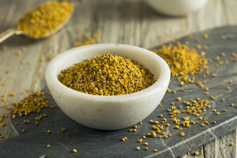 Raw Organic Yellow Bee Pollen Stock Photo - Image of granules ...