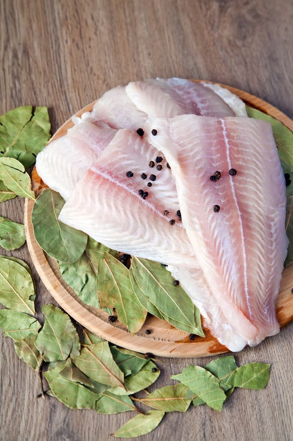 Fillet of Pangasius stock photo. Image of white, black - 18440414