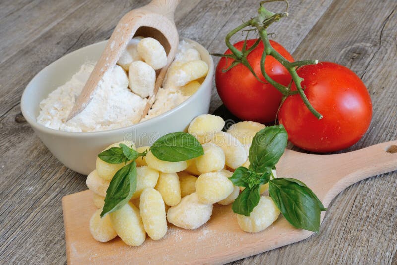 Raw pasta dumplings stock photo. Image of gnocchi, grinder - 33643590