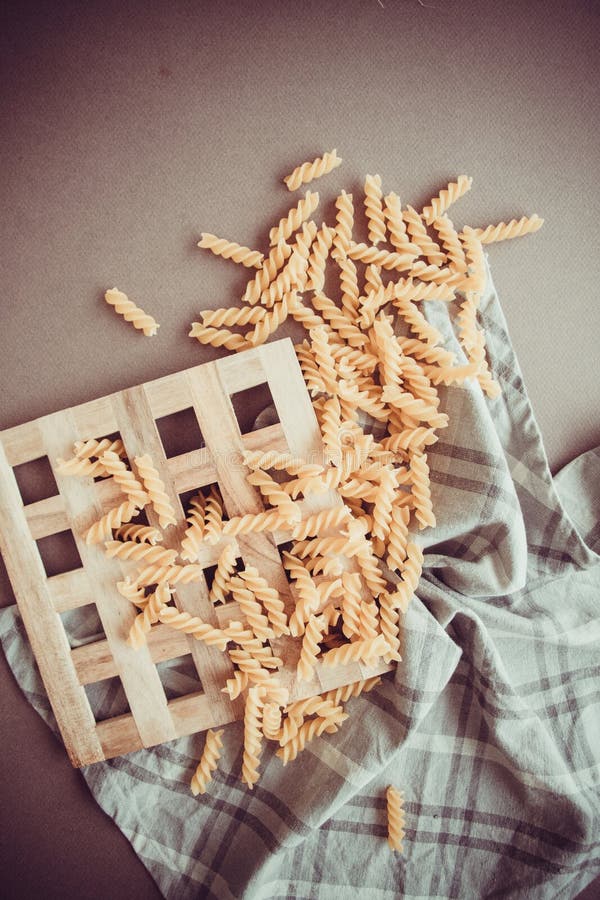 Raw pasta fusilli stock photo. Image of dinner, cooked - 72964860