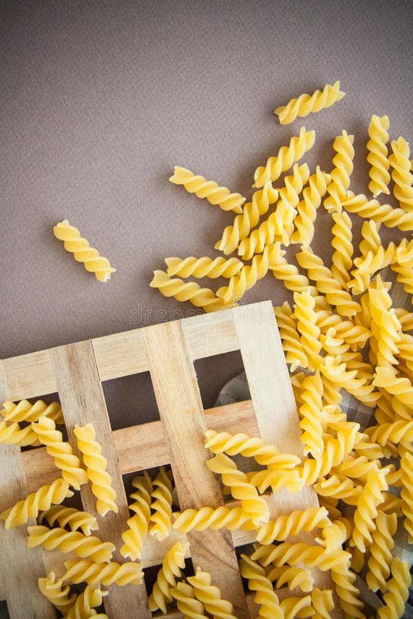 Raw pasta fusilli stock photo. Image of gourmet, carbohydrates - 72969042