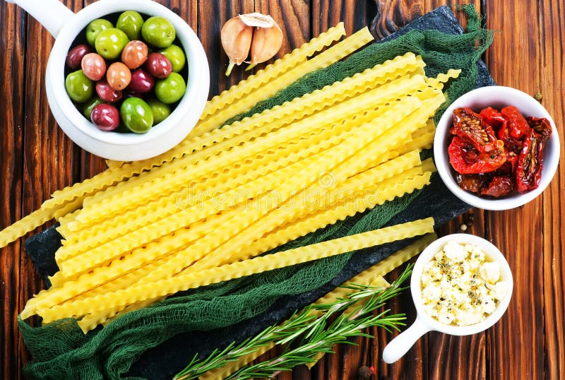 Raw pasta stock photo. Image of chef, board, spaghetti - 82425176