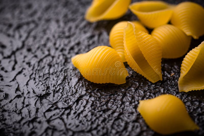 Raw Pasta in Shape of Shells Stock Photo - Image of italian, cooking ...