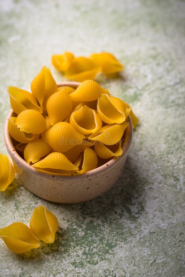Raw Pasta in Shape of Shells Stock Photo - Image of noodle, cuisine ...