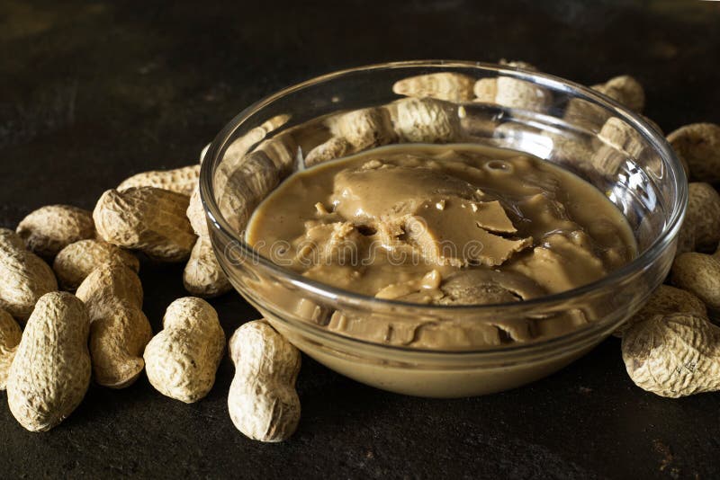 Peanuts with peanut butter stock image. Image of nutrition - 216323079