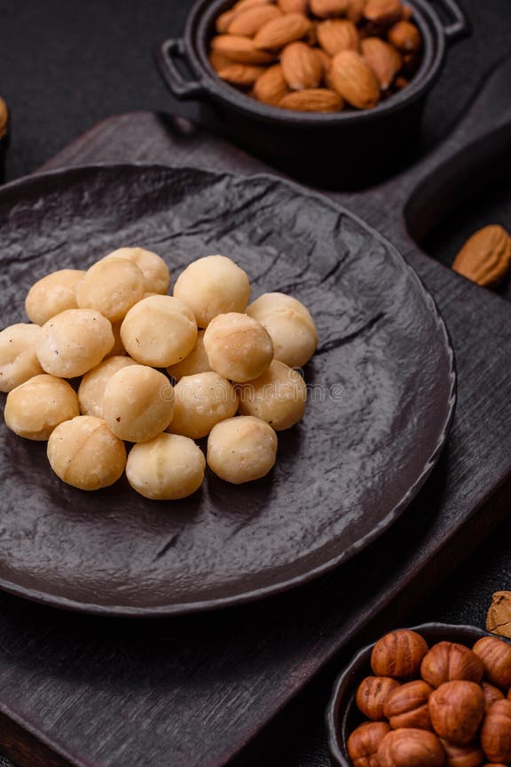 Raw Peeled Macadamia Nut in Ceramic Bowl Stock Image - Image of ...