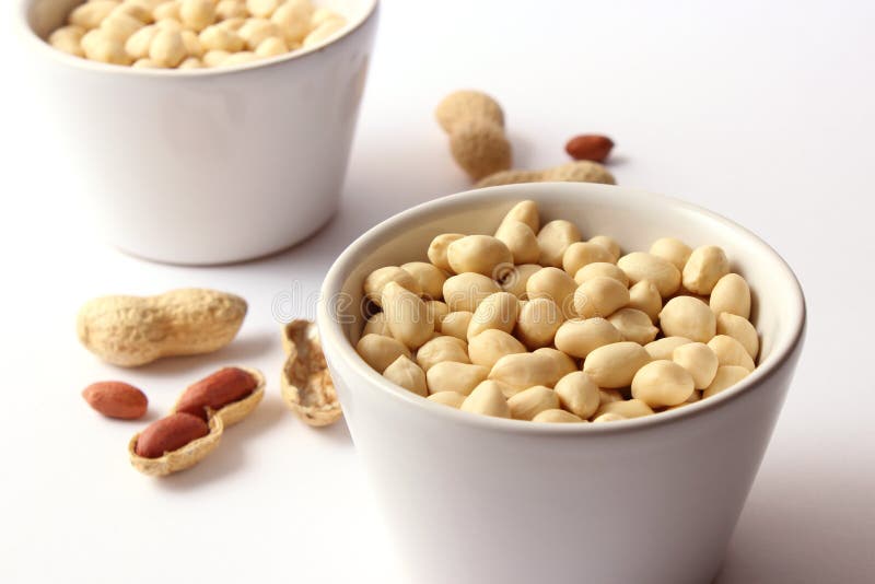 Raw Peeled Peanuts on a Light Background Stock Image - Image of closeup ...