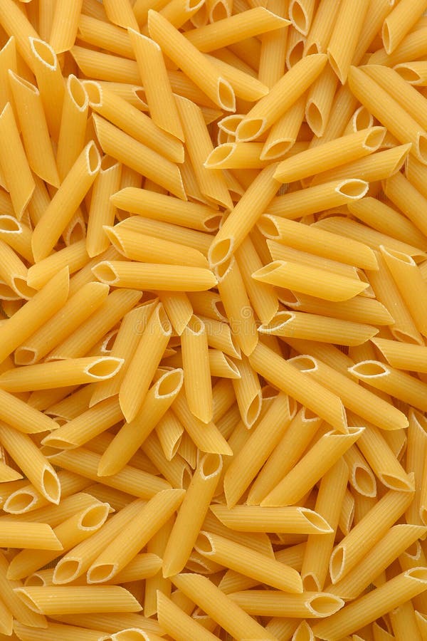 Raw penne pasta background stock image. Image of meal - 274767913