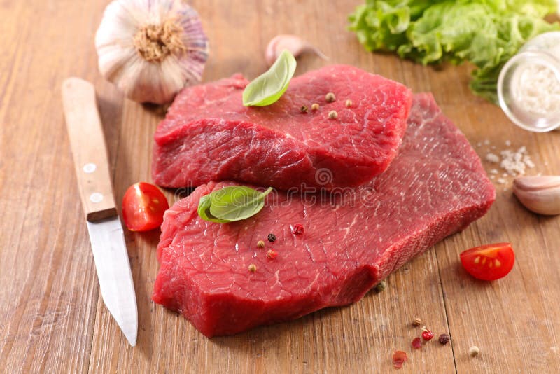 Raw piece of beef stock photo. Image of herb, wood, sirloin - 146452238