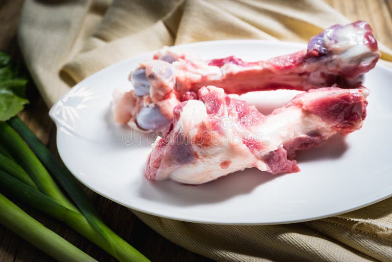 Raw pig bone stock image. Image of tableware, bone, fresh - 58380311