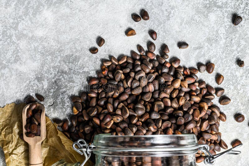 Raw Pine Nut in a Shell. Gray Background. Top View Stock Photo - Image ...
