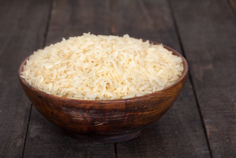 Raw Plain Rice in Wooden Bowl Stock Image - Image of bowl, japanese ...