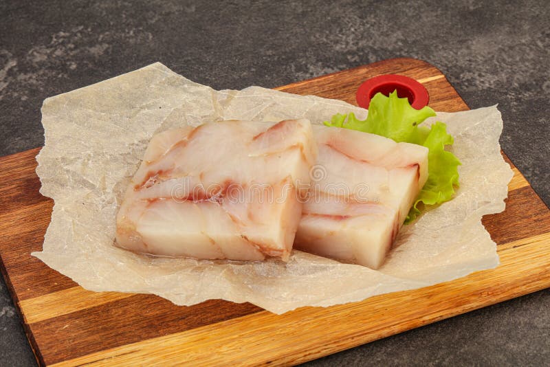 Raw Pollock Fish Fillet for Cooking Stock Image - Image of parsley ...