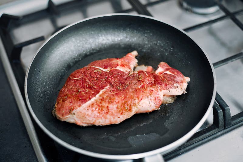 Raw Pork Chop In A Frying Pan With Rosemary Pepper And Salt Stock Image Image Of Close
