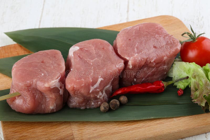 Raw pork fillet mignon stock photo. Image of blue, diet - 66651998