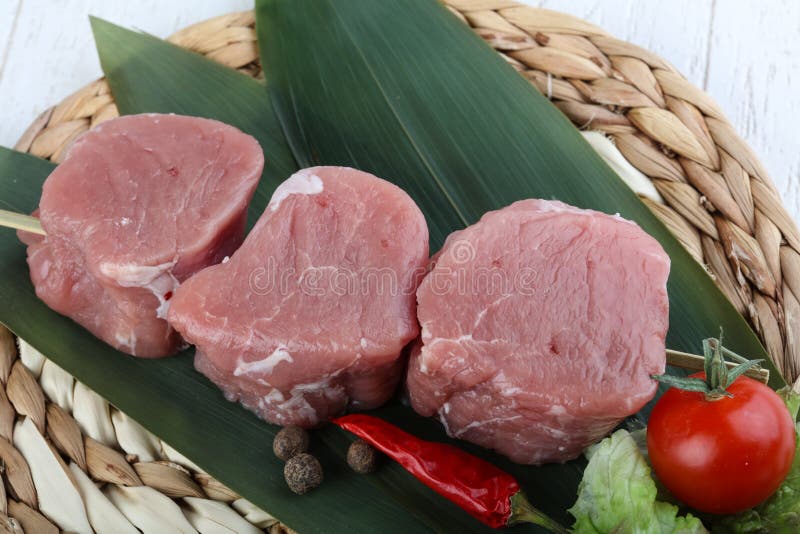 Raw pork fillet mignon stock image. Image of fillet, blue - 66726983