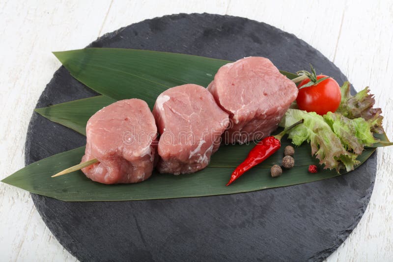Raw pork fillet mignon stock image. Image of vegetables - 66726989