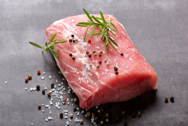 Raw pork loin with spices stock image. Image of food - 114339193