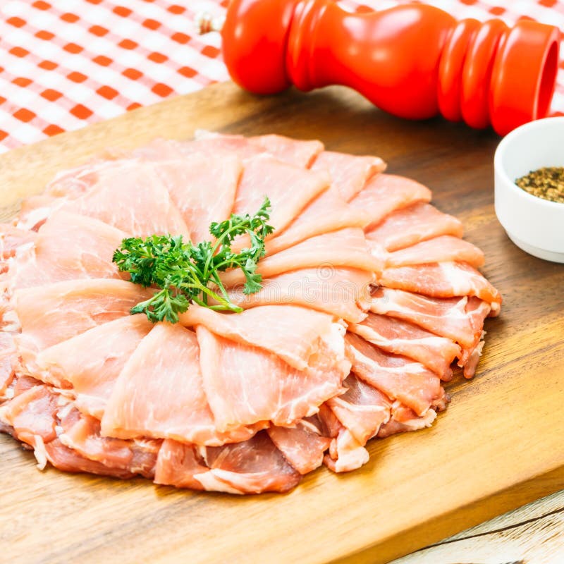 Raw pork meat slice stock image. Image of parsley, closeup - 106305143