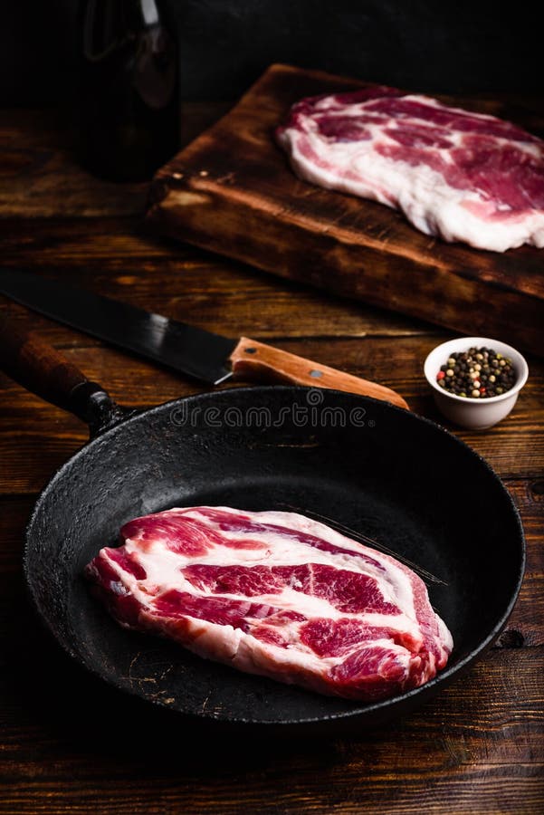 Raw Pork Neck Steak in Skillet Stock Photo - Image of meat, fillet ...