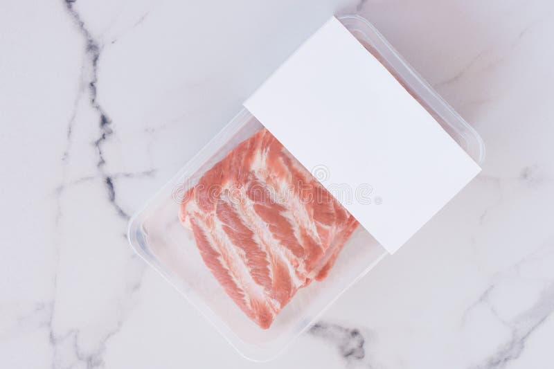 Raw Pork Ribs in Vacuum Packaging on Marble Background, Logo Mockup for ...