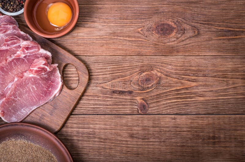 Raw Pork Schnitzel with the Ingredients . Stock Image - Image of ...