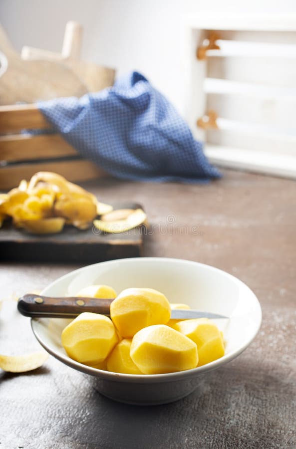 Raw potato in bowl stock photo. Image of vegetable, potato - 266151660