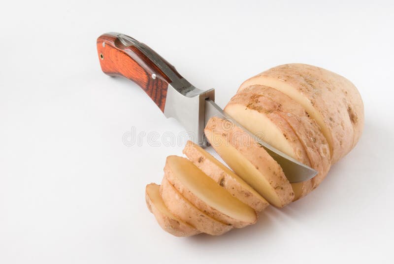 Raw Potatoes Cut with Knife Stock Photo - Image of agriculture, portion ...