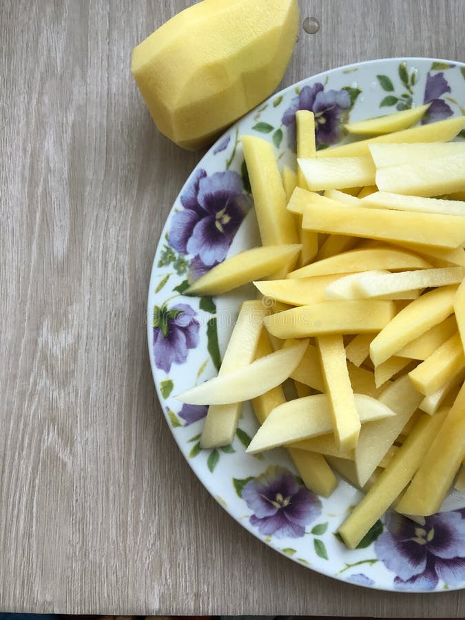 Raw Potatoes Cut for Making French Fries Stock Photo - Image of fries ...