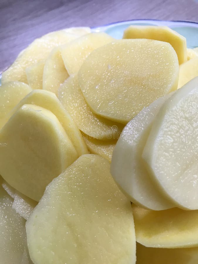 Raw Potatoes Cut into Round Pieces for Cooking and Baking Stock Image ...