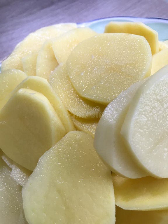 Raw Potatoes Cut into Round Pieces for Cooking and Baking Stock Image ...