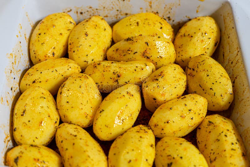 Raw Potatoes with Spices Prepared for Baking Stock Photo - Image of ...