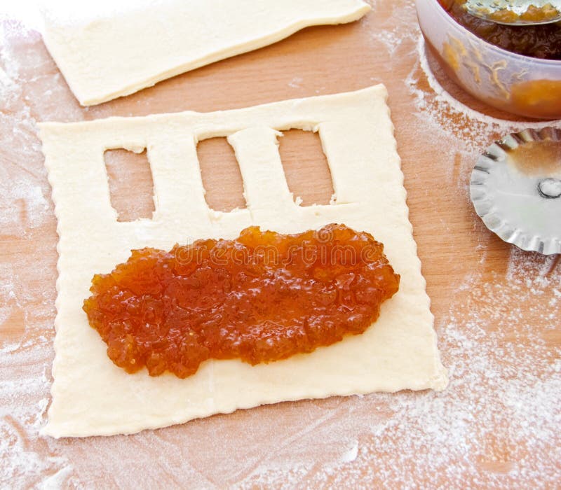 Raw puff pastry with jam. stock photo. Image of food - 14255492