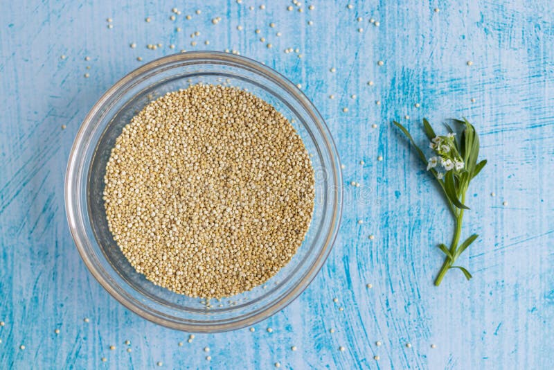 Raw Quinoa Grains Inside Bowl, on Blue Table Stock Image - Image of ...