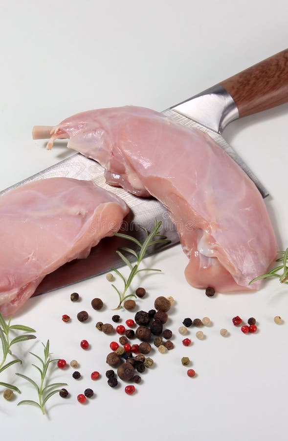 Raw Rabbit Legs with Bone with Peppercorns on a White Background Stock ...