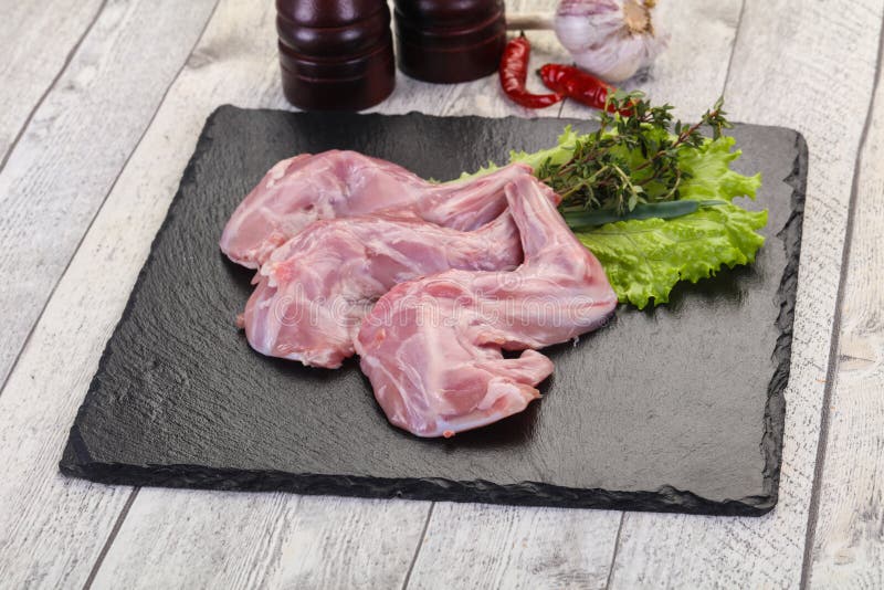 Raw rabbit legs stock photo. Image of piece, nutrition - 185234272