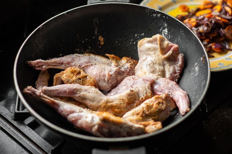 Raw Rabbit with Spices in a Pan. Cooking Stewed Rabbit Stock Image ...
